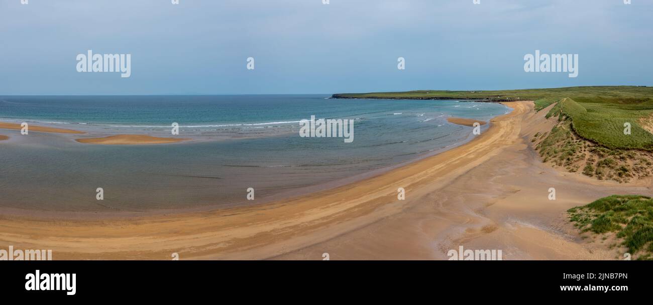A panorama drone landscape view of the beautiful golden sand beach at ...