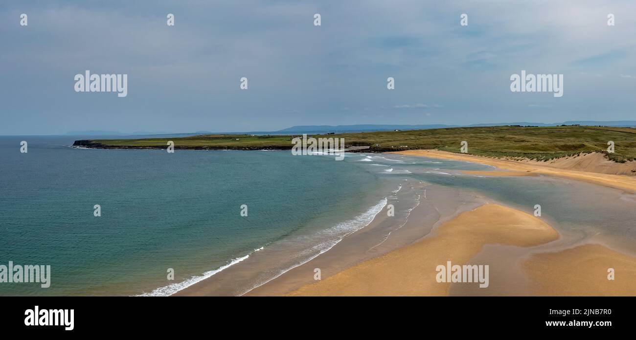 A panorama drone landscape view of the beautiful golden sand beach at ...