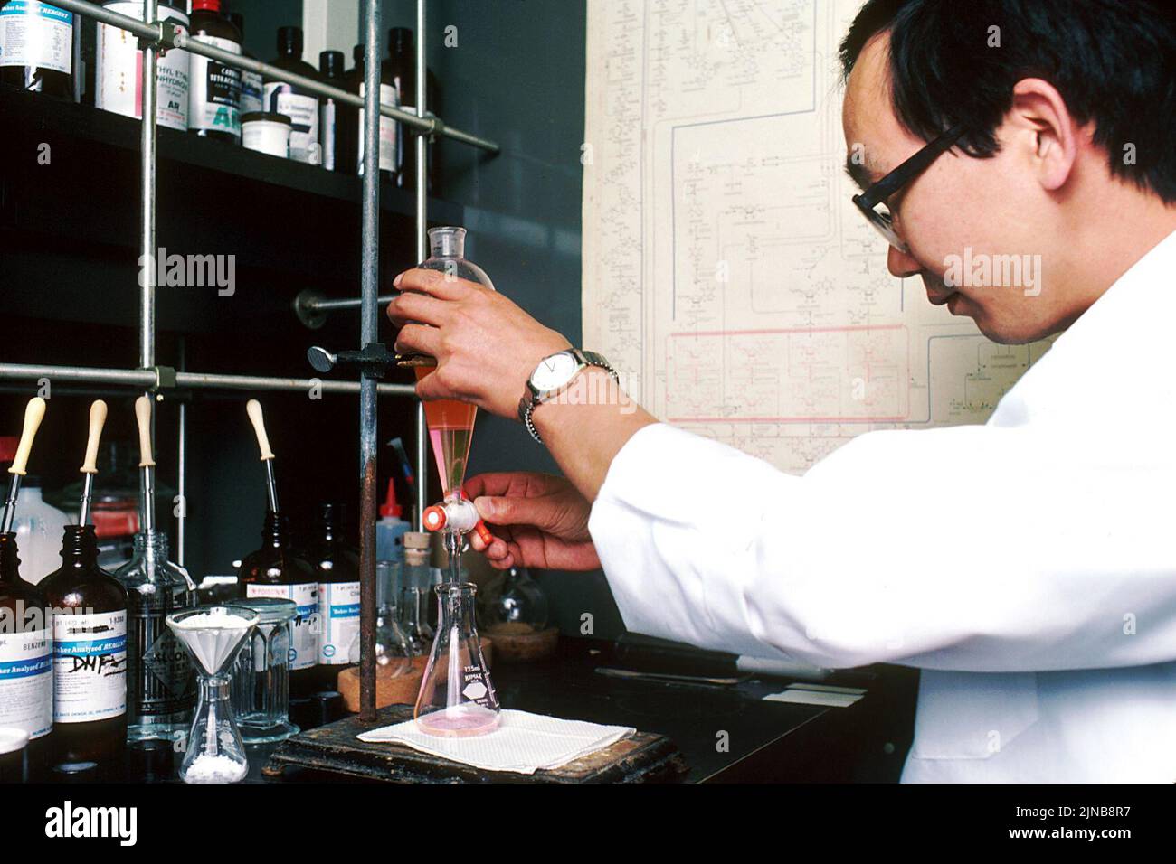 Technician performing drug synthesis Stock Photo - Alamy