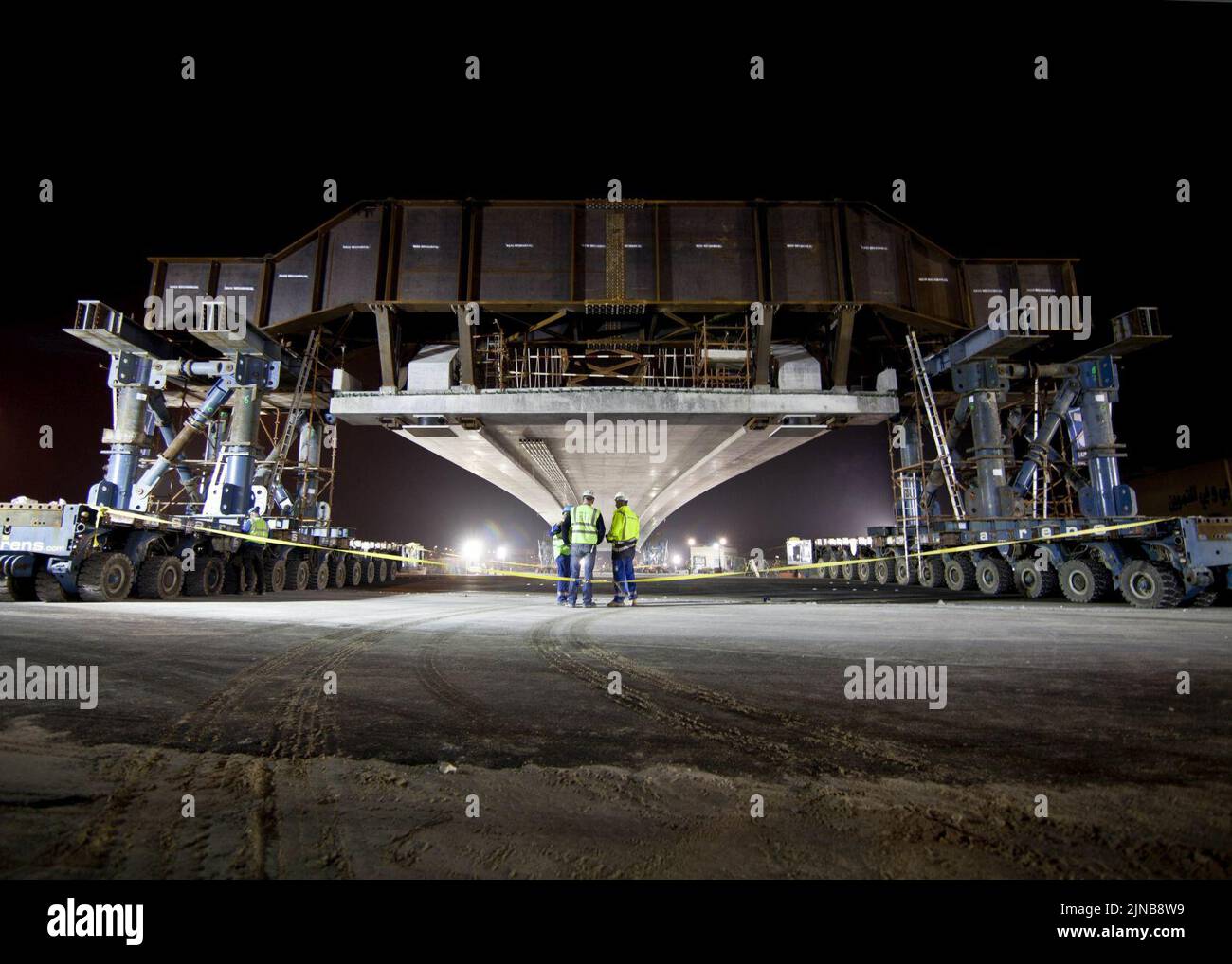 Technicians discuss preparations for the move of the tied arch bridge ...