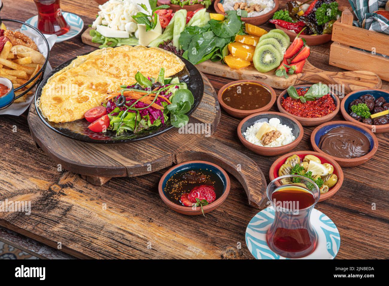 Traditional Turkish Breakfast served with traditional turkish tea on ...