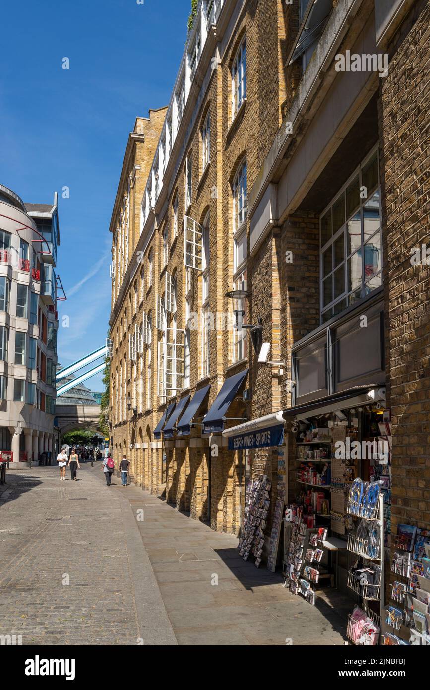 Pedestrianised developed area of Shad Thames, with Divine Butler News ...