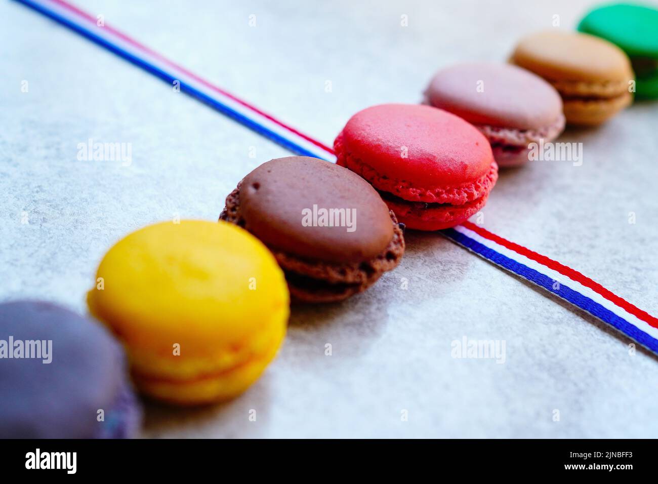 Macaroons with ribbon in the color of the French flag Stock Photo - Alamy