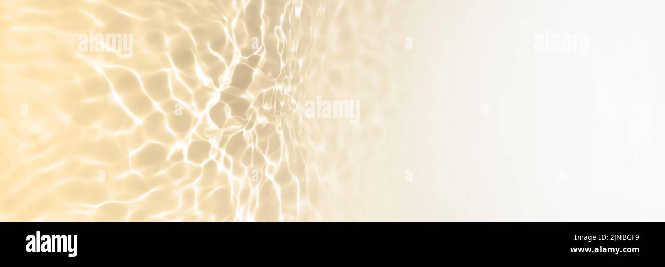 Surface of toned in pastel yellow swimming pool water with light ...