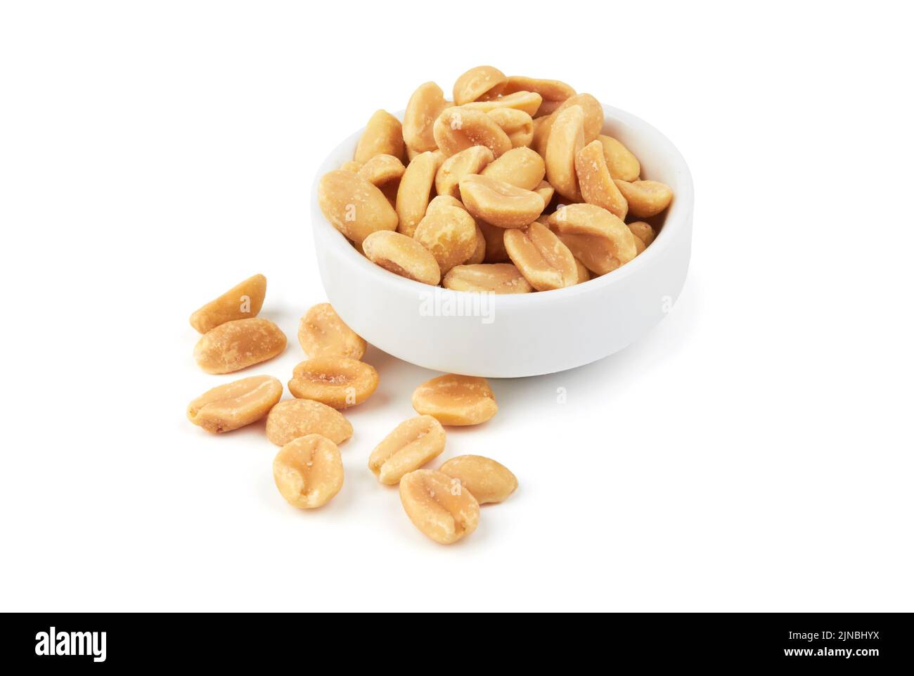 Peanuts in a bowl isolated on a white background Stock Photo - Alamy