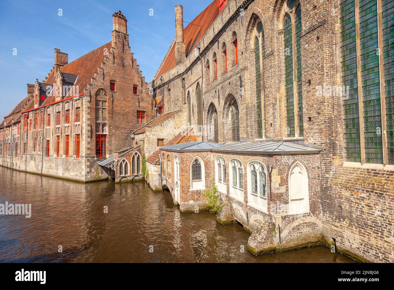 Traditional flemish architecture with Canal Houses of Bruges, Belgium ...