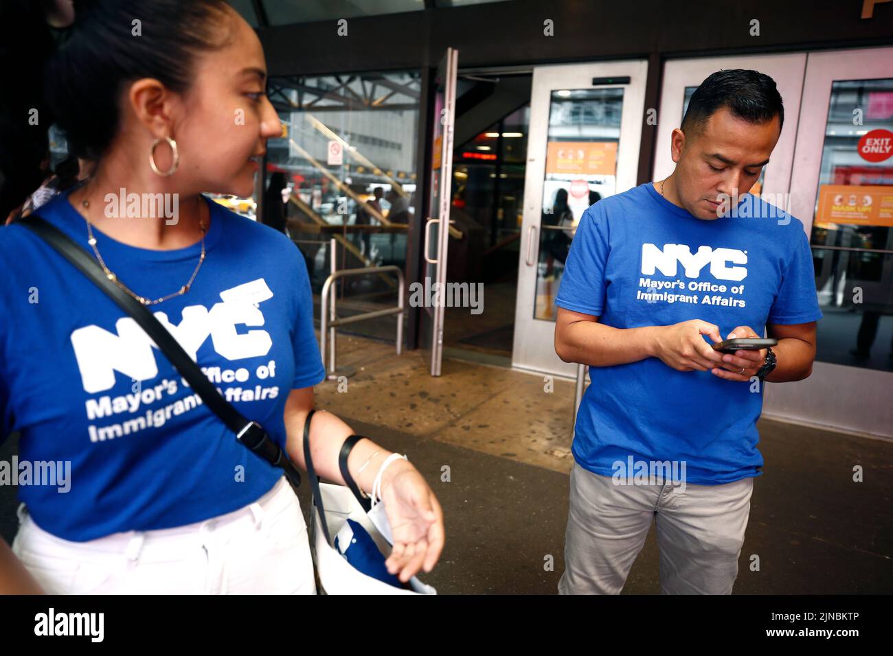 New York City Mayor's office for Immigrant Affairs employees stand ...