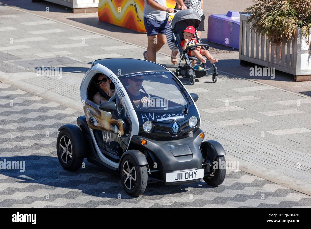 Environmentally friendly Renault Twizy electric microcar side front ...