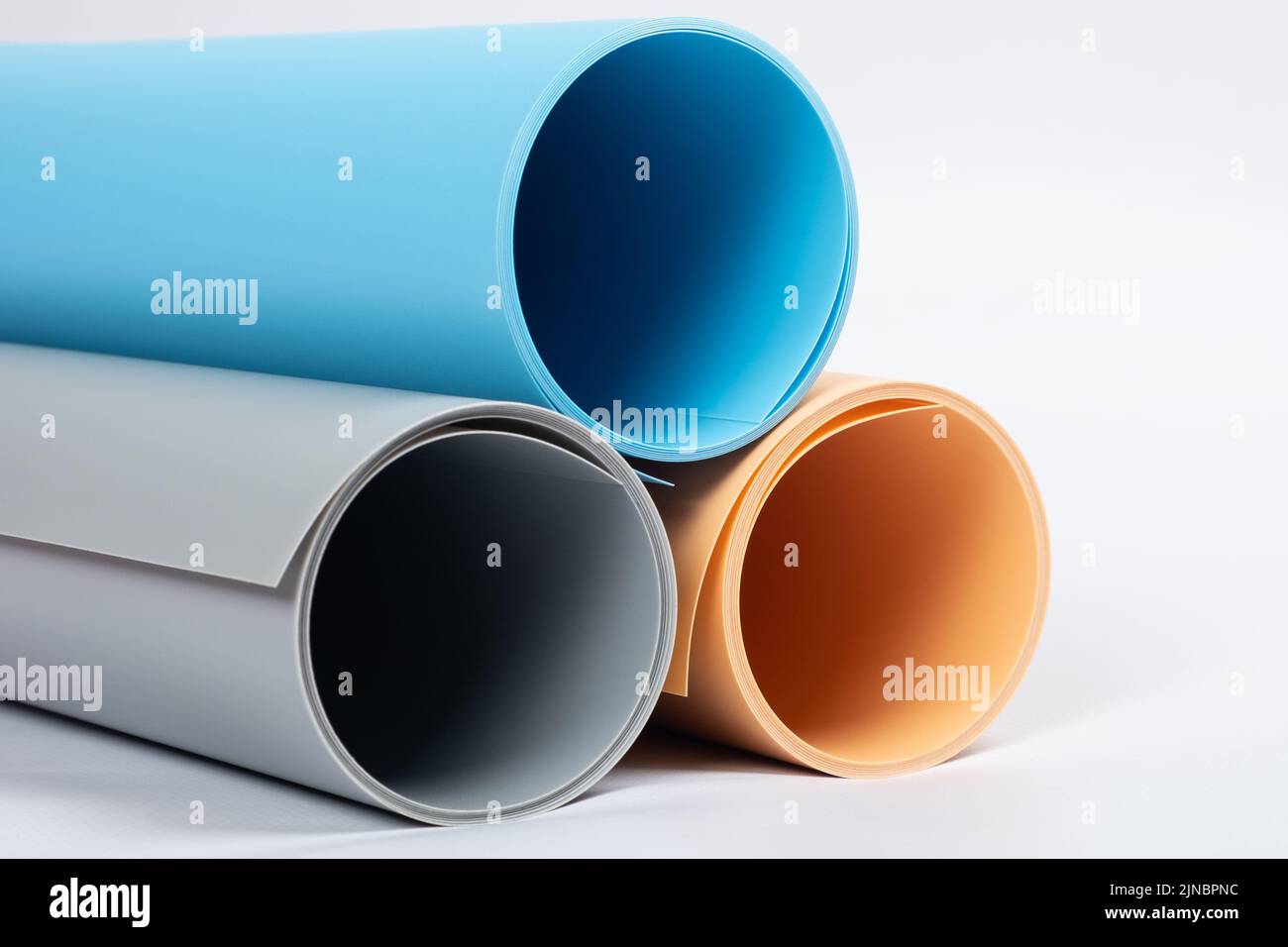 colored photo backdrops set closeup on white background Stock Photo - Alamy