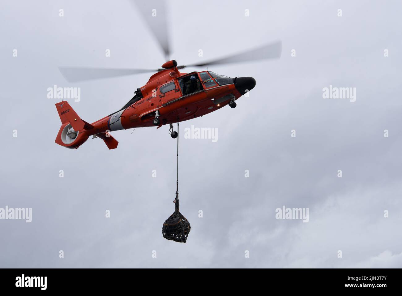 The Coast Guard Air Station Houston MH-65 Dolphin helicopter crew ...