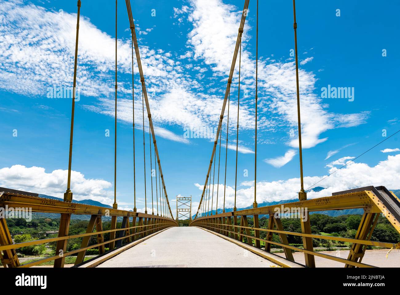 Yellow bridge over Cauca river in Santa Fe de Antioquia, Colombia Stock ...
