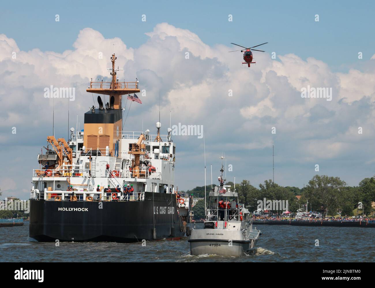 The USCG Hollyhock and a motor lifeboat from Coast Guard Station Grand ...
