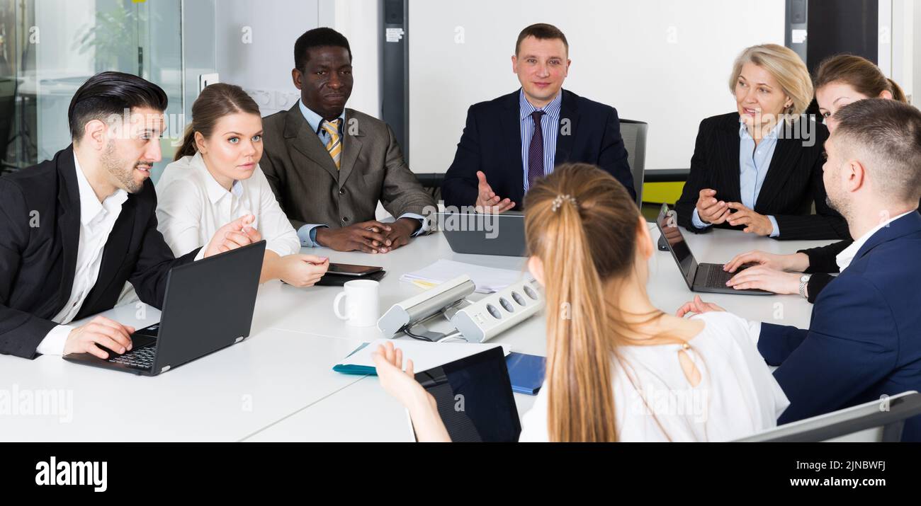 International group of confident business managers at teamwork Stock ...