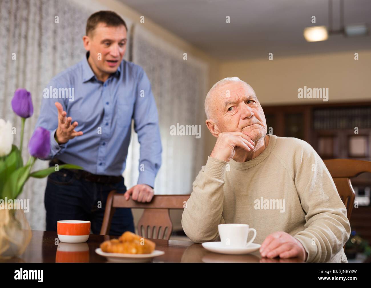 Man and his adult son having conflict Stock Photo - Alamy