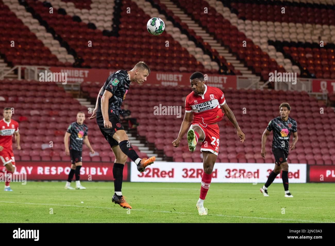 Mads Andersen #6 of Barnsley and Chuba Akpom #29 of Middlesbrough both ...
