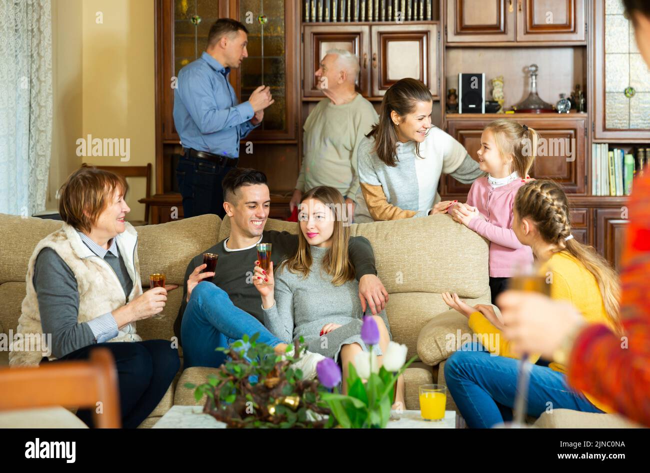 Happy family carefree communicating Stock Photo - Alamy