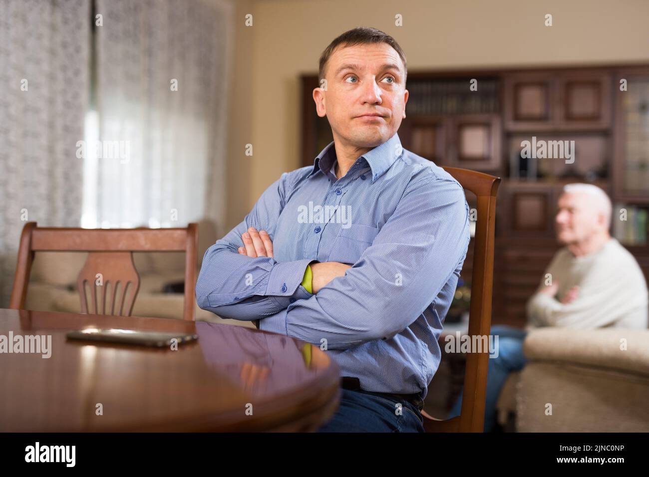 Man having problems in relationship with father Stock Photo - Alamy