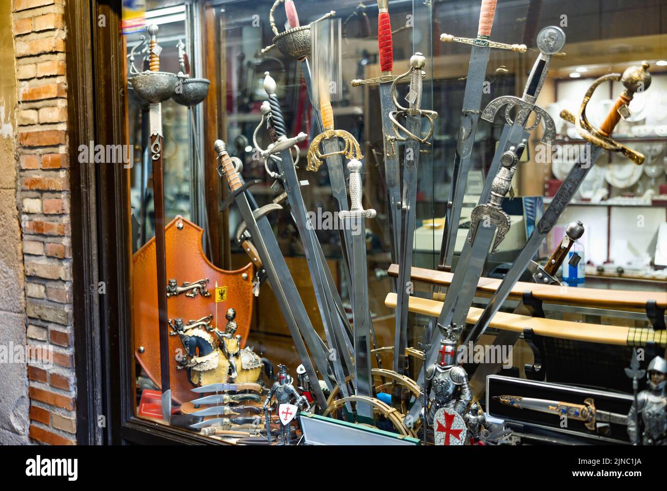 Handcrafted swords and daggers in artisan shop of Toledo Stock Photo ...