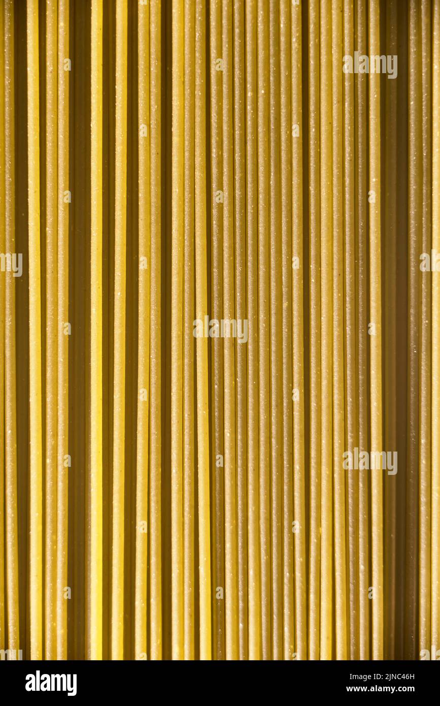 Italian healthy food background, raw spinach spaghetti filling the ...