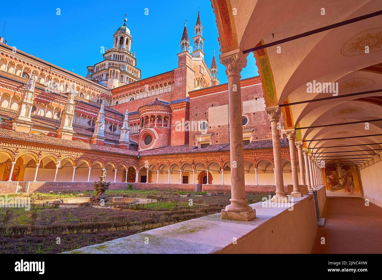 Visit small cloister with the garden of Certosa di Pavia monastery and ...