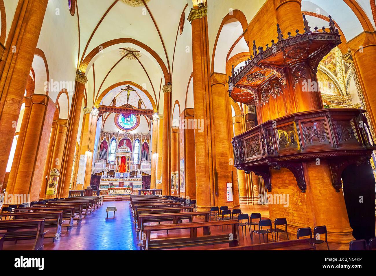 PAVIA, ITALY - APRIL 9, 2022: The old wooden pulpit in gothic Church of ...