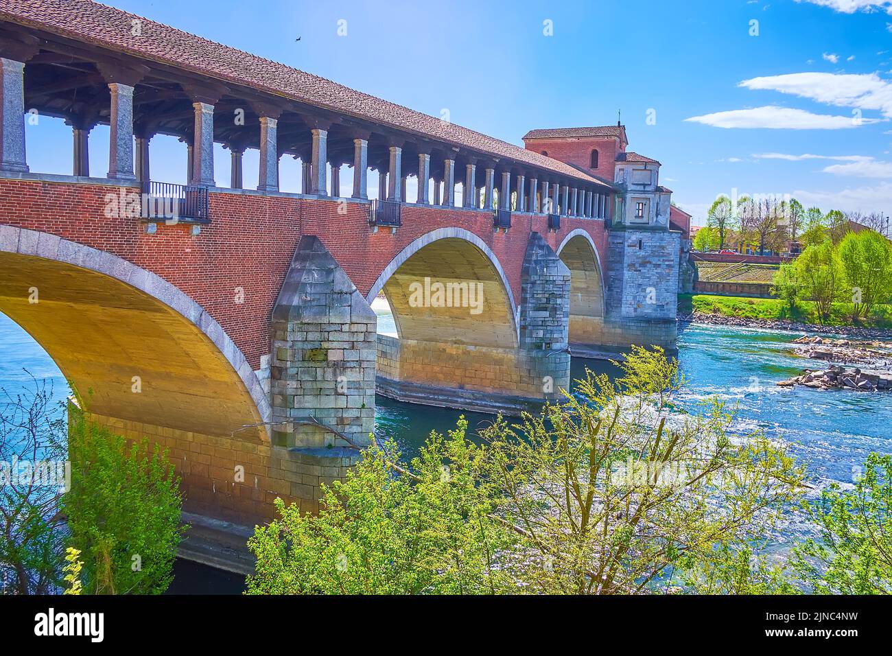 Ponte Coperto bridge across Ticino river is a proud of medieval Pavia ...