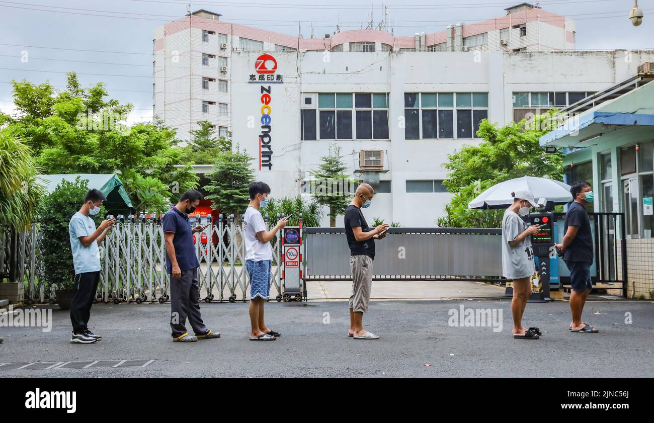 HAIKOU, CHINA - AUGUST 10, 2022 - Citizens line up for nucleic acid ...