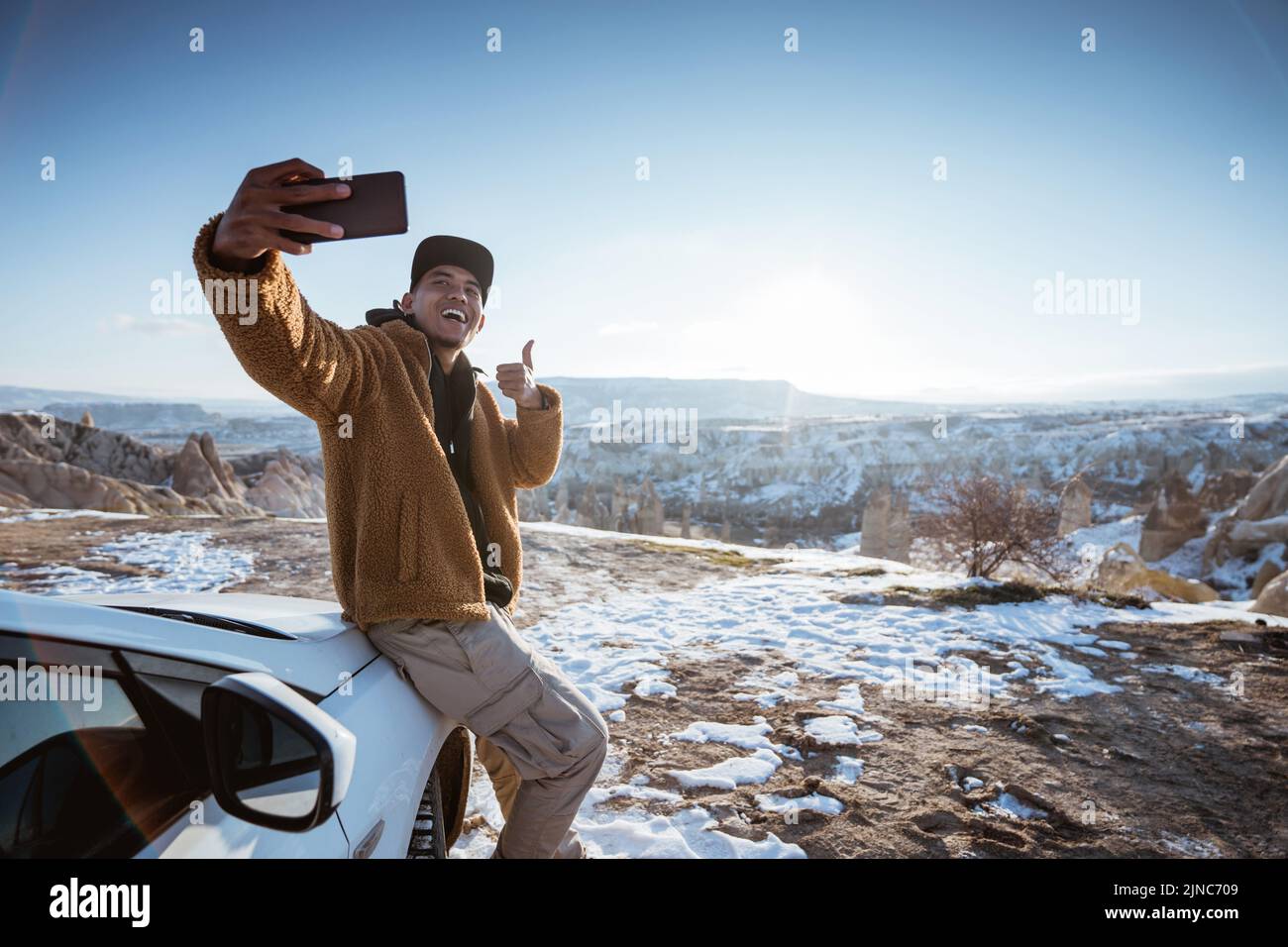 man take his photo using smart phone during adventure in cappadocia ...