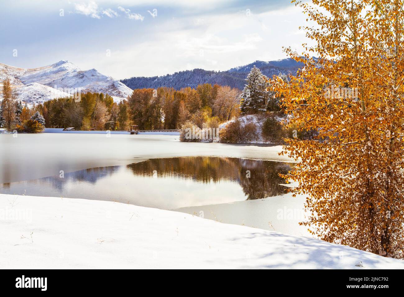 An early October snow blankets the autumn colors and scenery near a ...