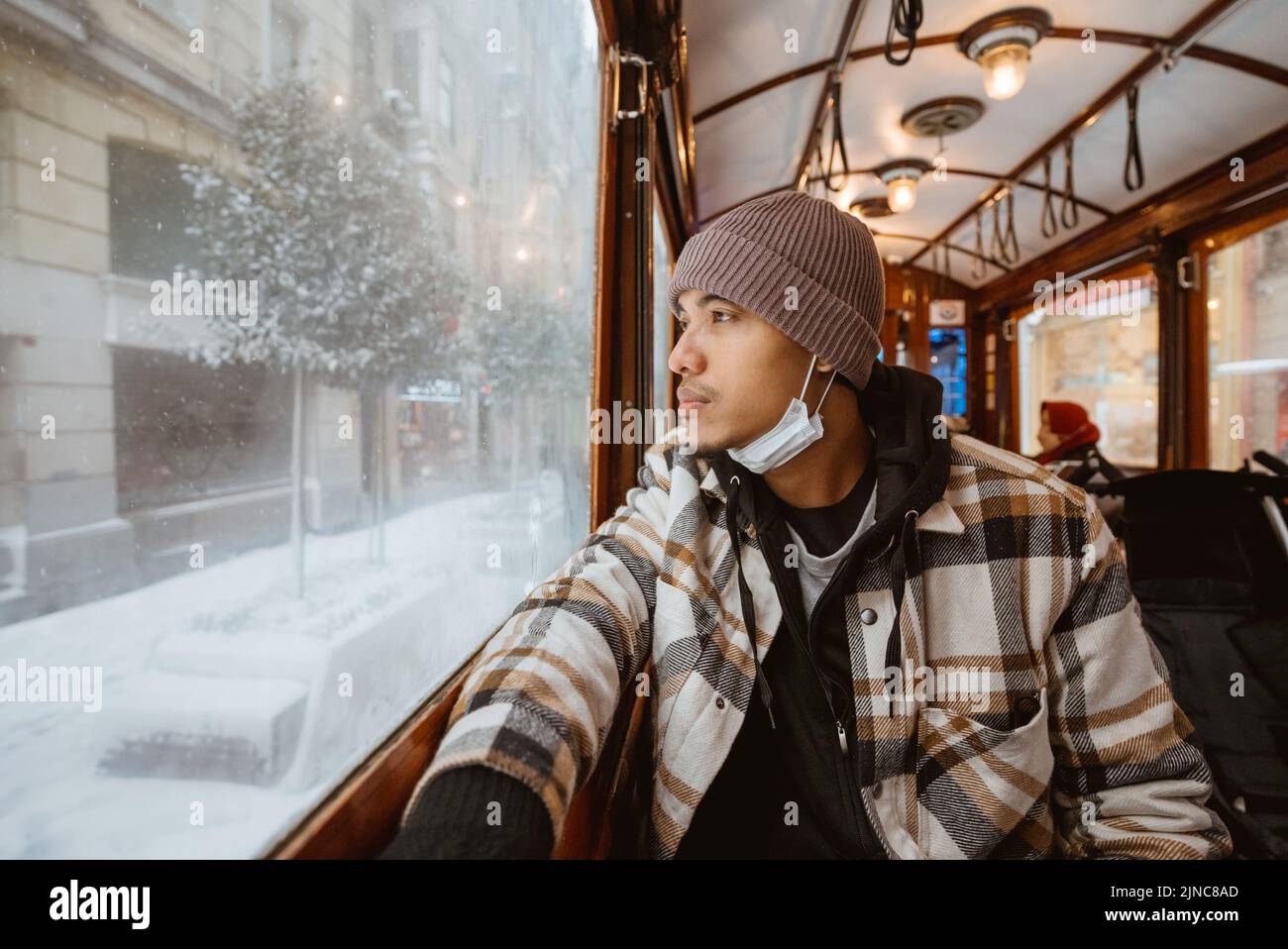 man passenger riding classic train during his trip to turkey in winter ...