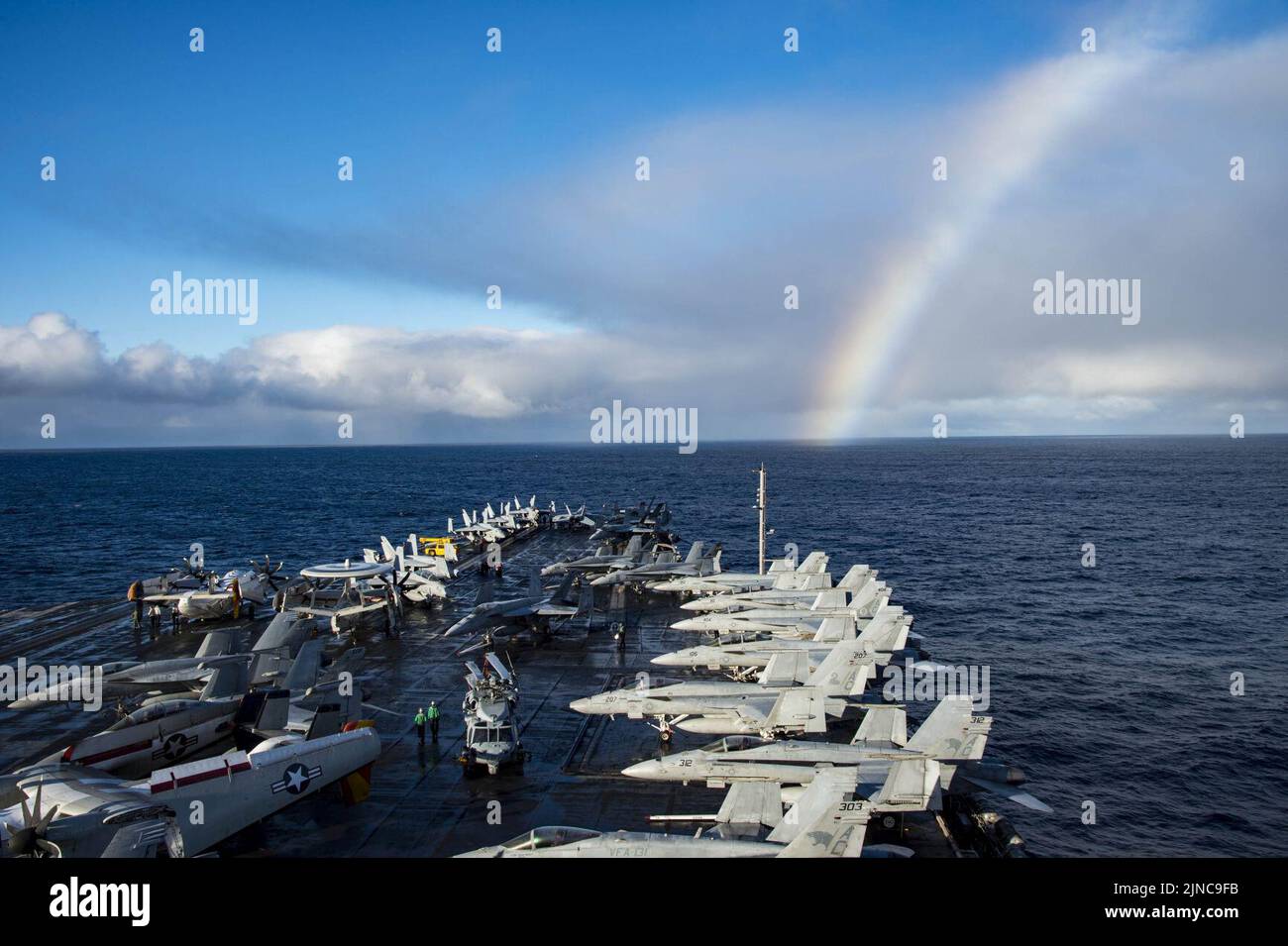The aircraft carrier USS Dwight D. Eisenhower (CVN 69) transits the ...