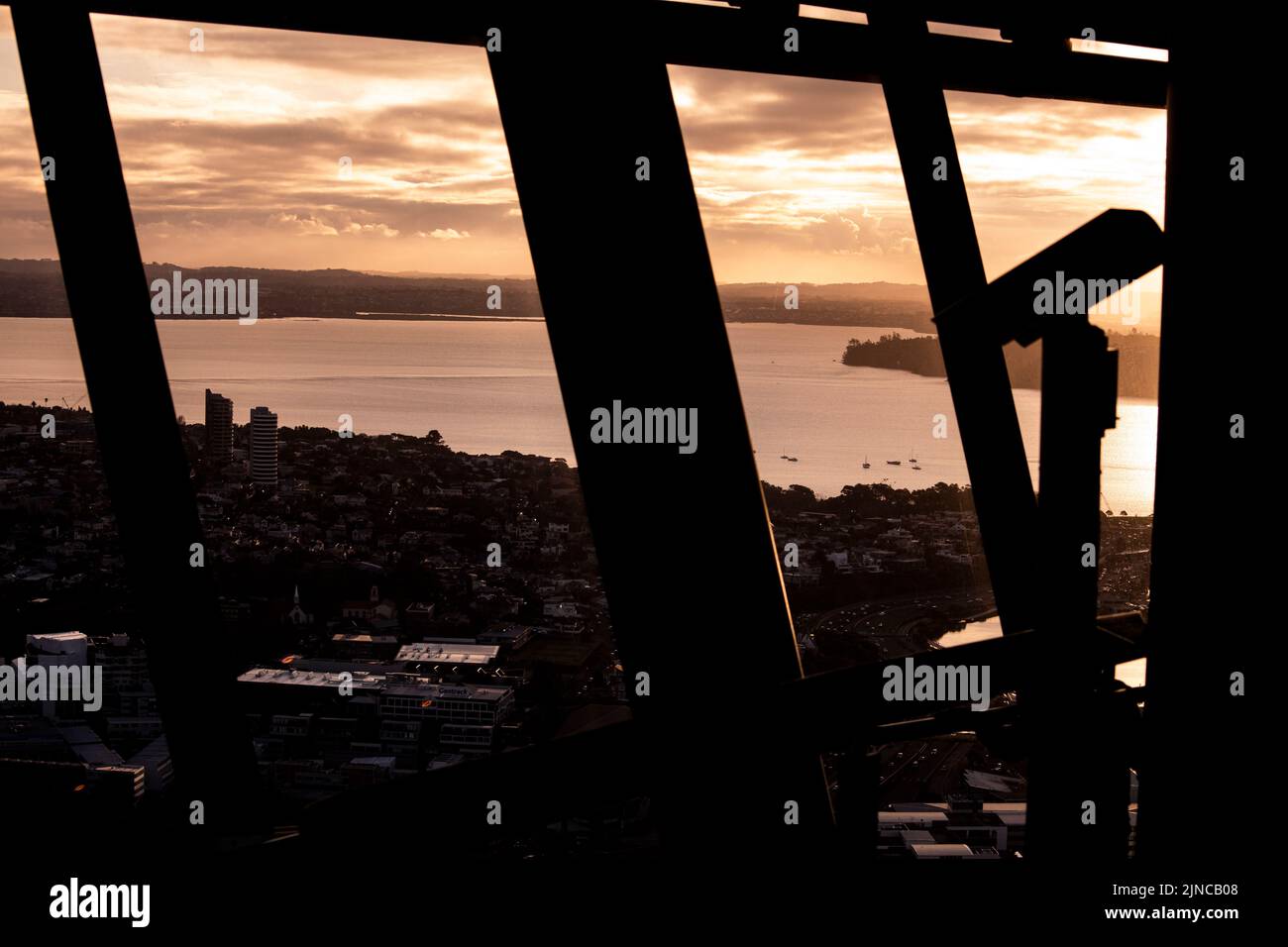 A view of the Auckland Viaduct with the ocean in the background at ...