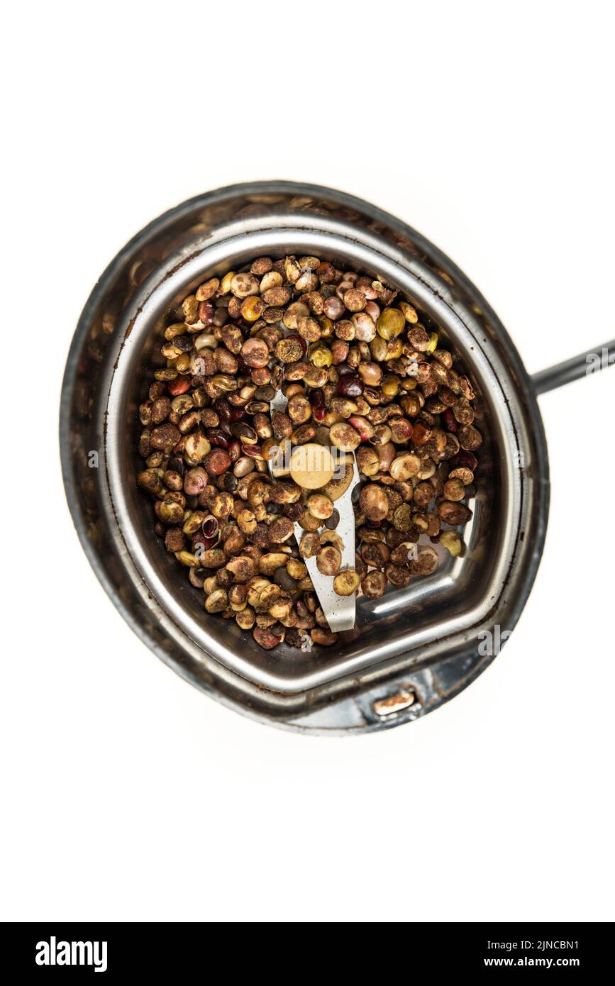 Whole dried unground sumac berries in a spice grinder top down Stock ...