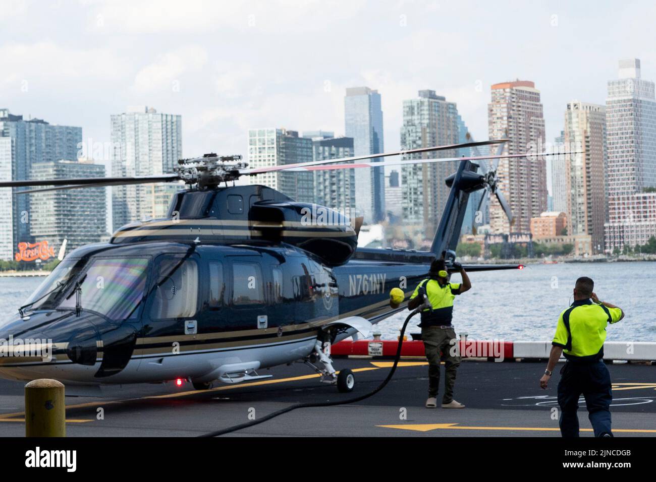 Hat blown off hi-res stock photography and images - Alamy