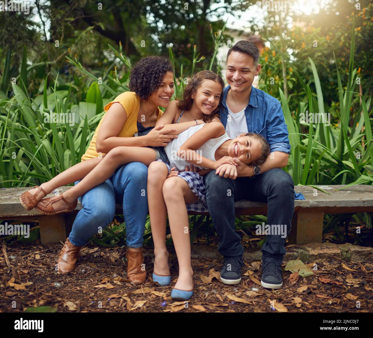 Children playing on a park bench hi-res stock photography and images ...