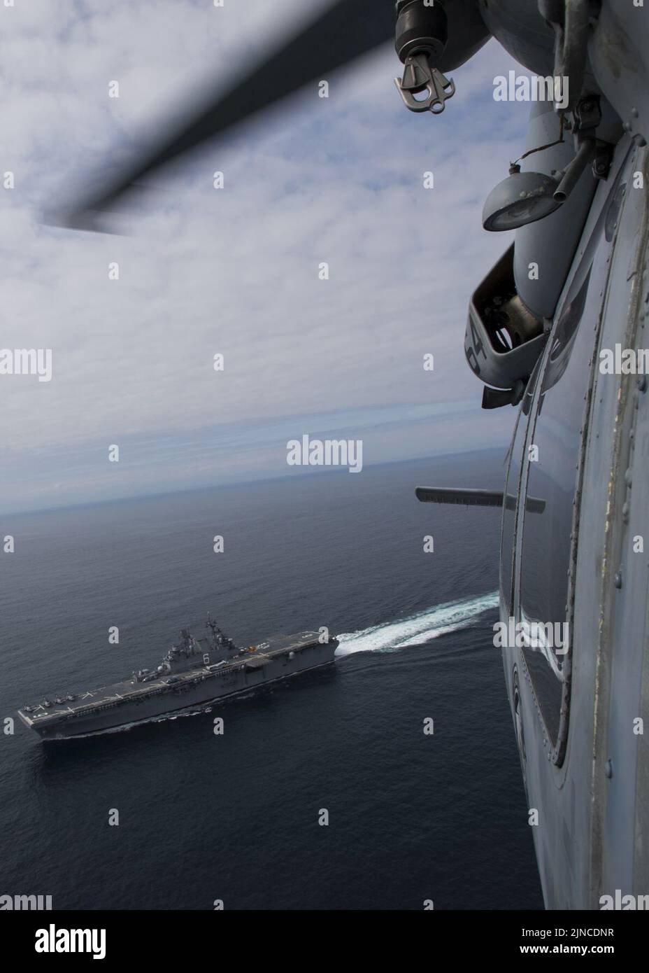 The amphibious assault ship USS America (LHA 6) transits the Pacific ...
