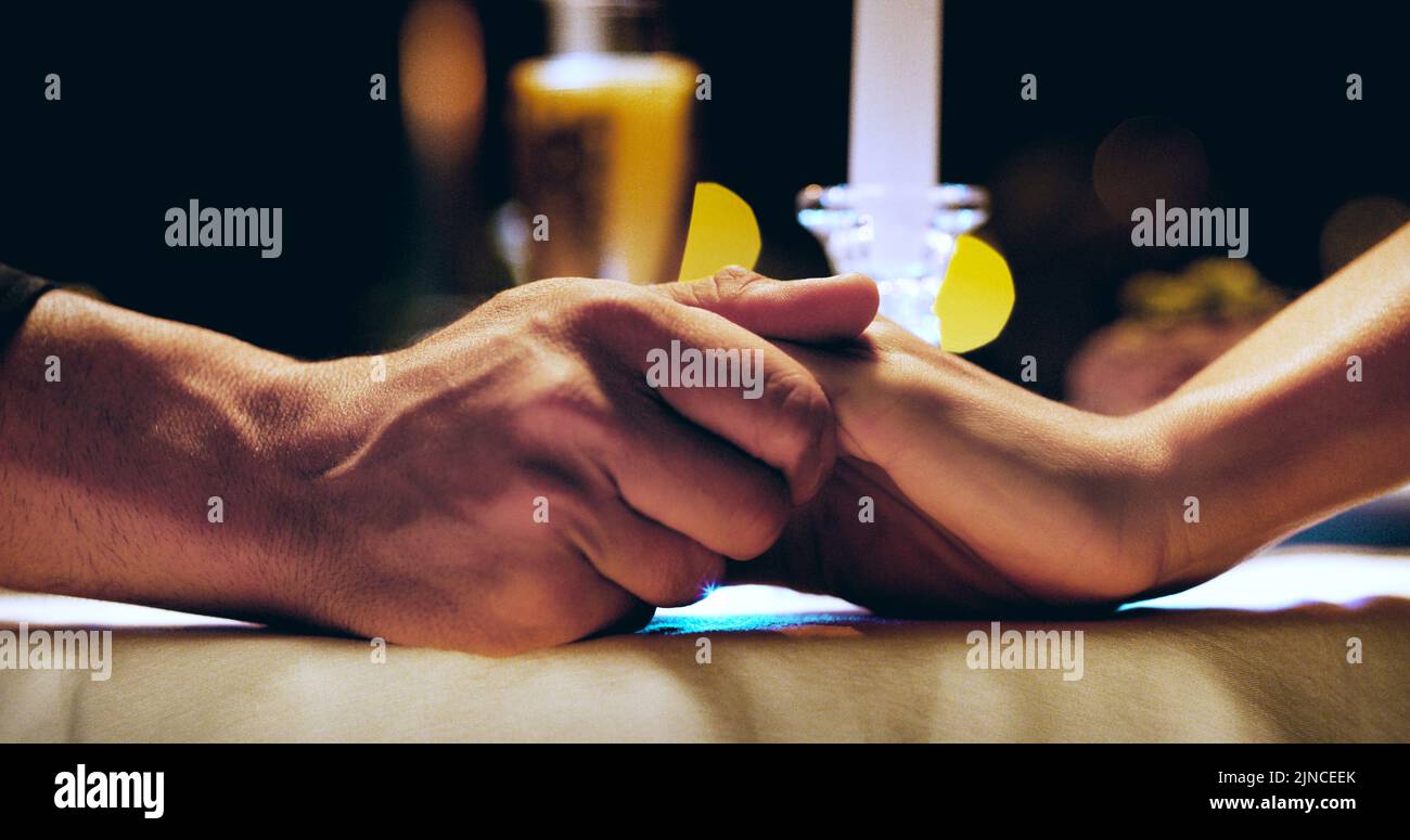 Hand in hand together, forever. an unrecognizable affectionate couple ...