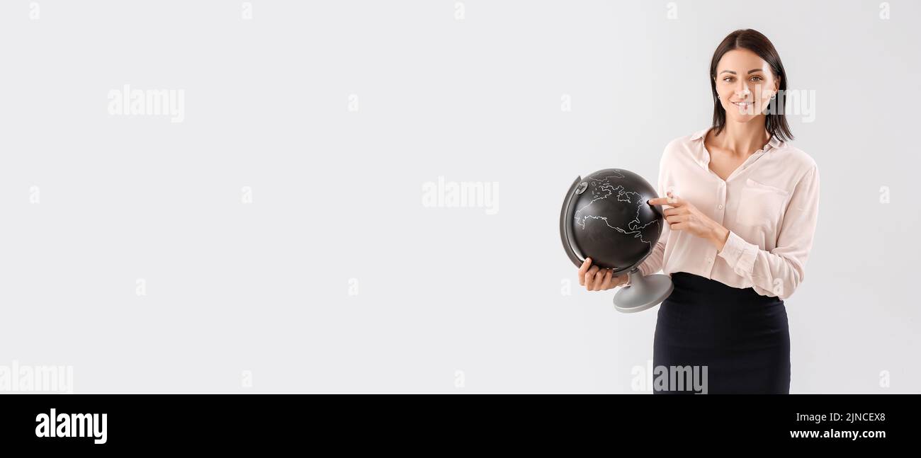 Female Geography teacher on light background with space for text Stock ...