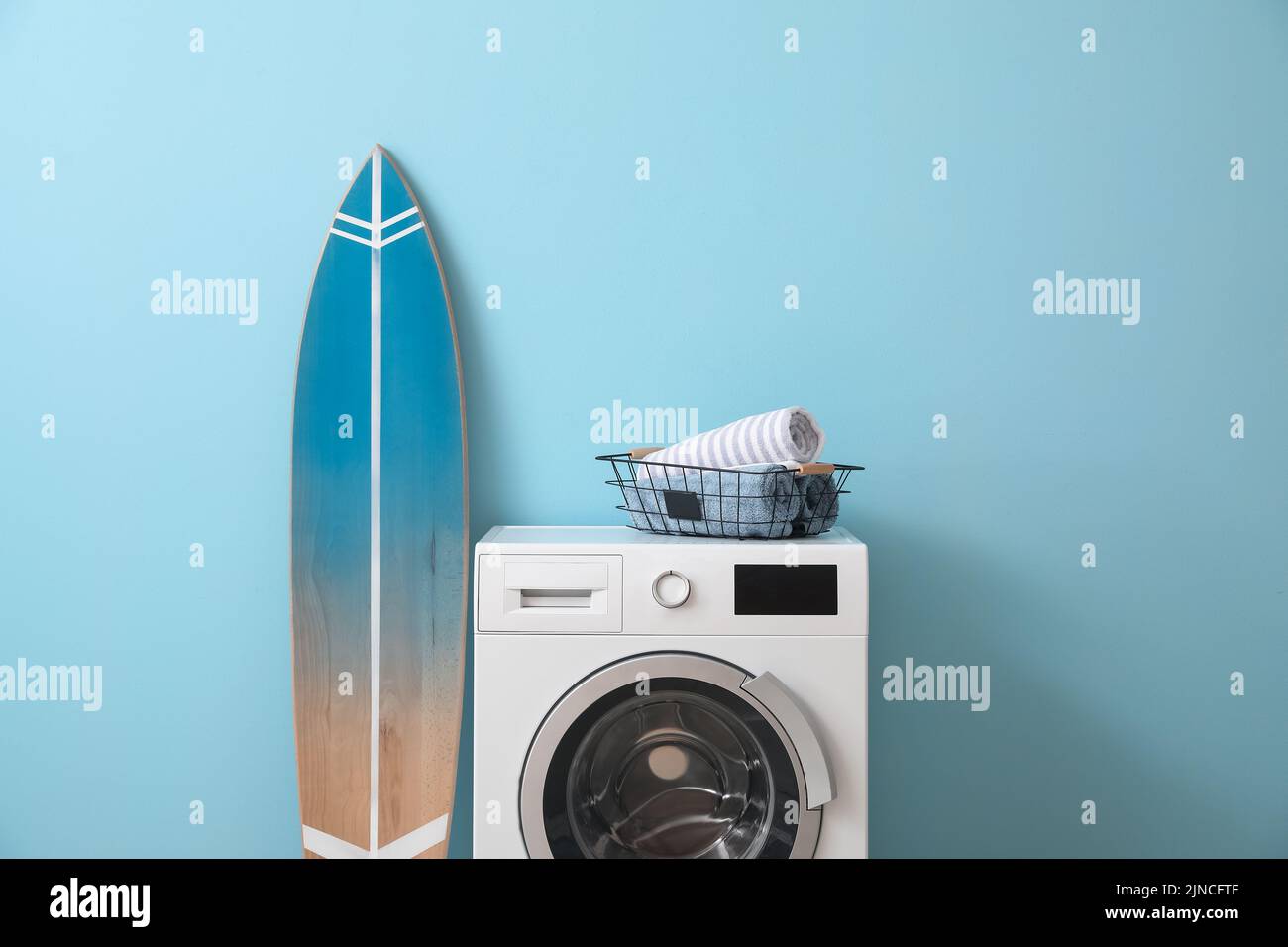Surfer washing surfboard hi-res stock photography and images - Alamy