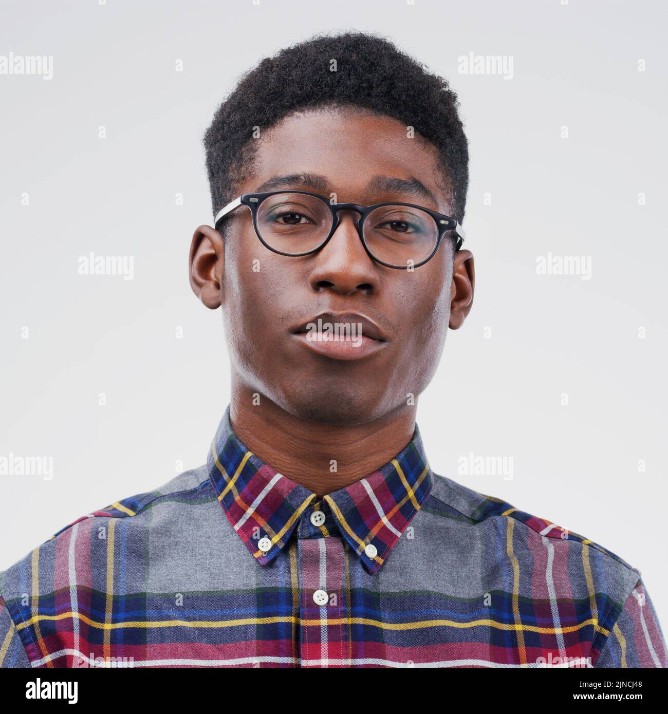 He keeps his feelings to himself. Studio portrait of a handsome young ...