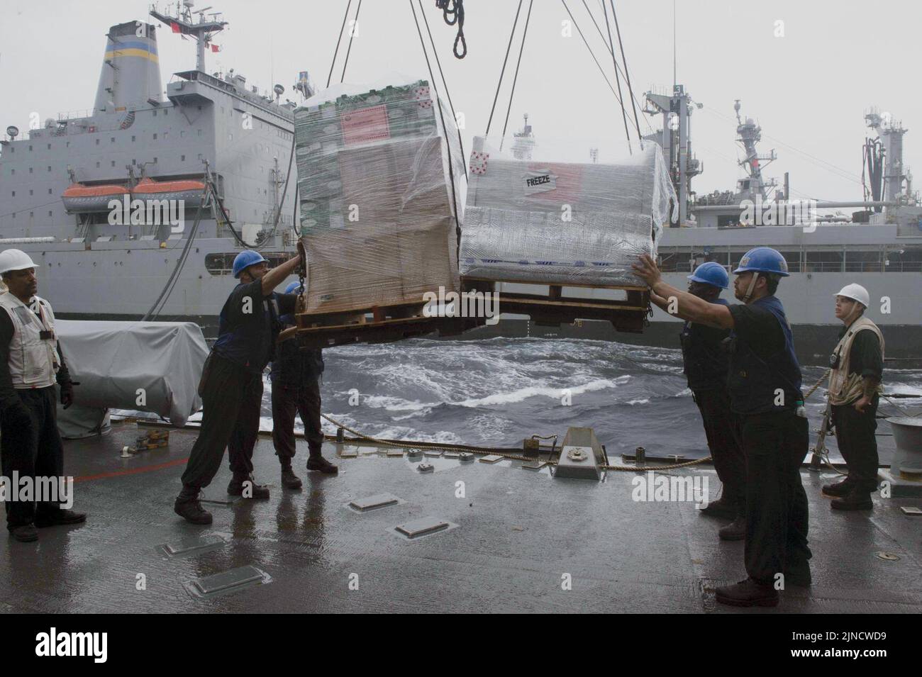 The Arleigh Burke-class destroyer USS Howard (DDG 83) conducts a ...