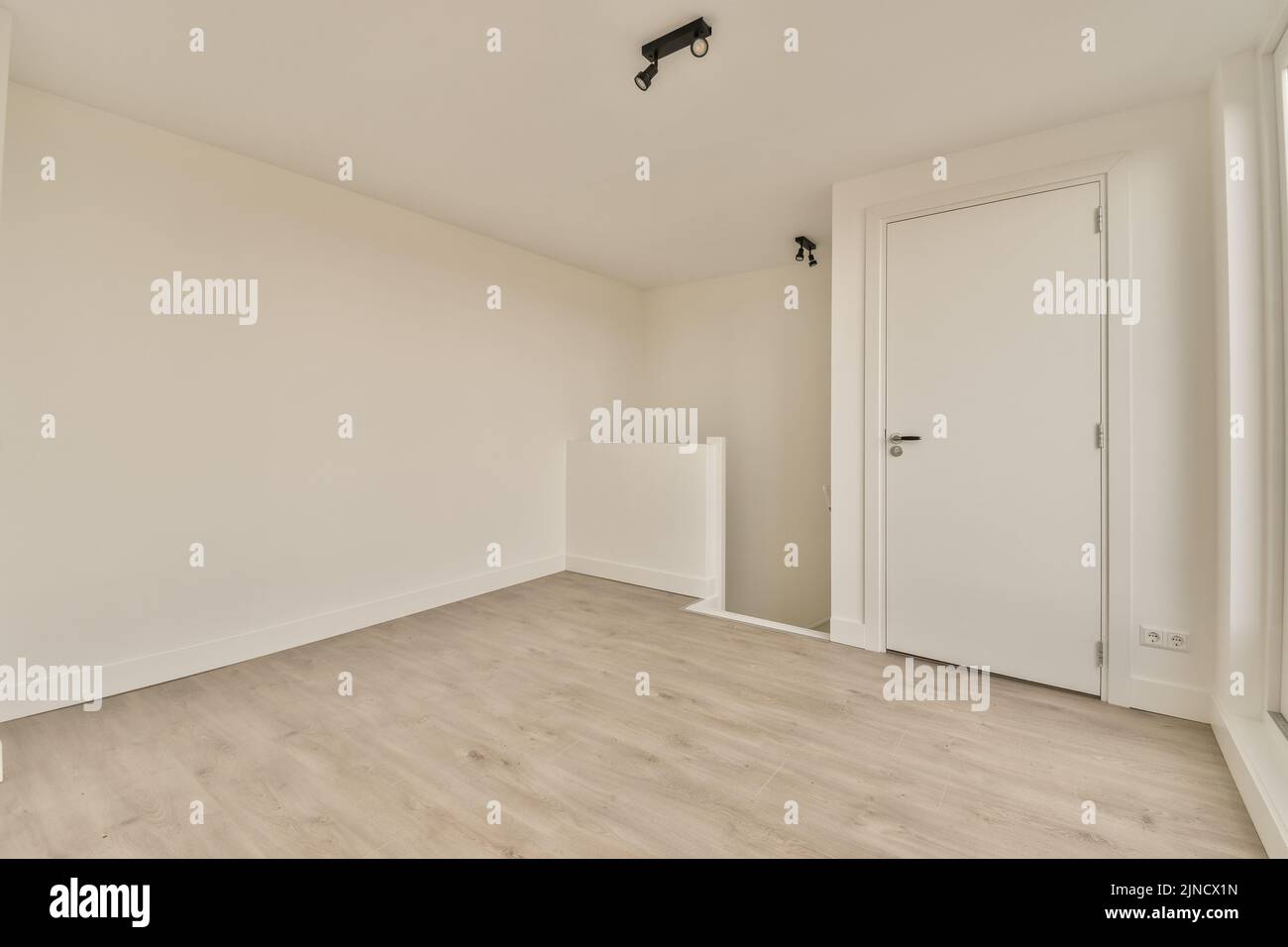 A cozy and spacious empty room in a luxury house Stock Photo - Alamy