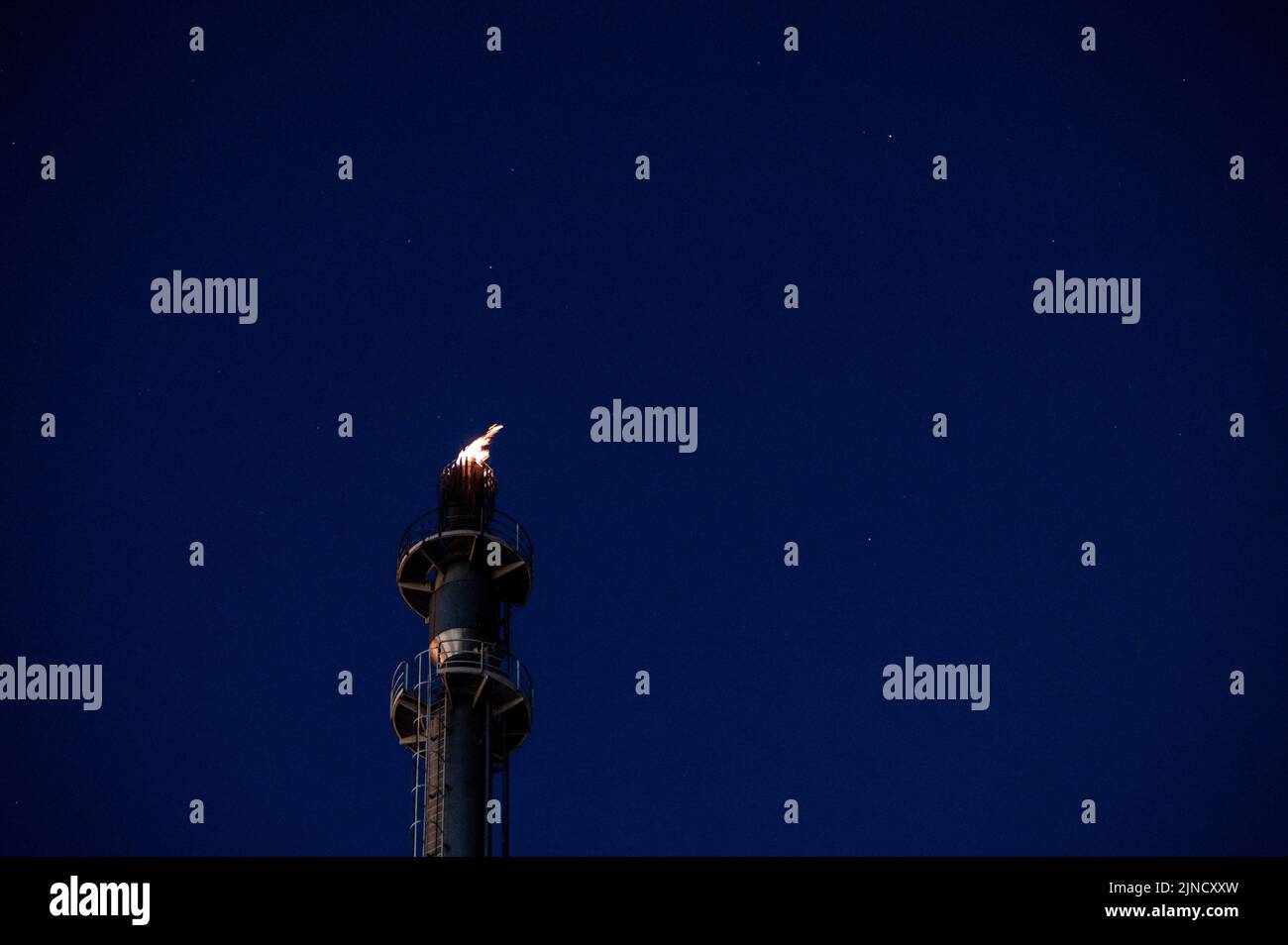 Moers, Germany. 09th Aug, 2022. Fire is seen at the gas flare of ...
