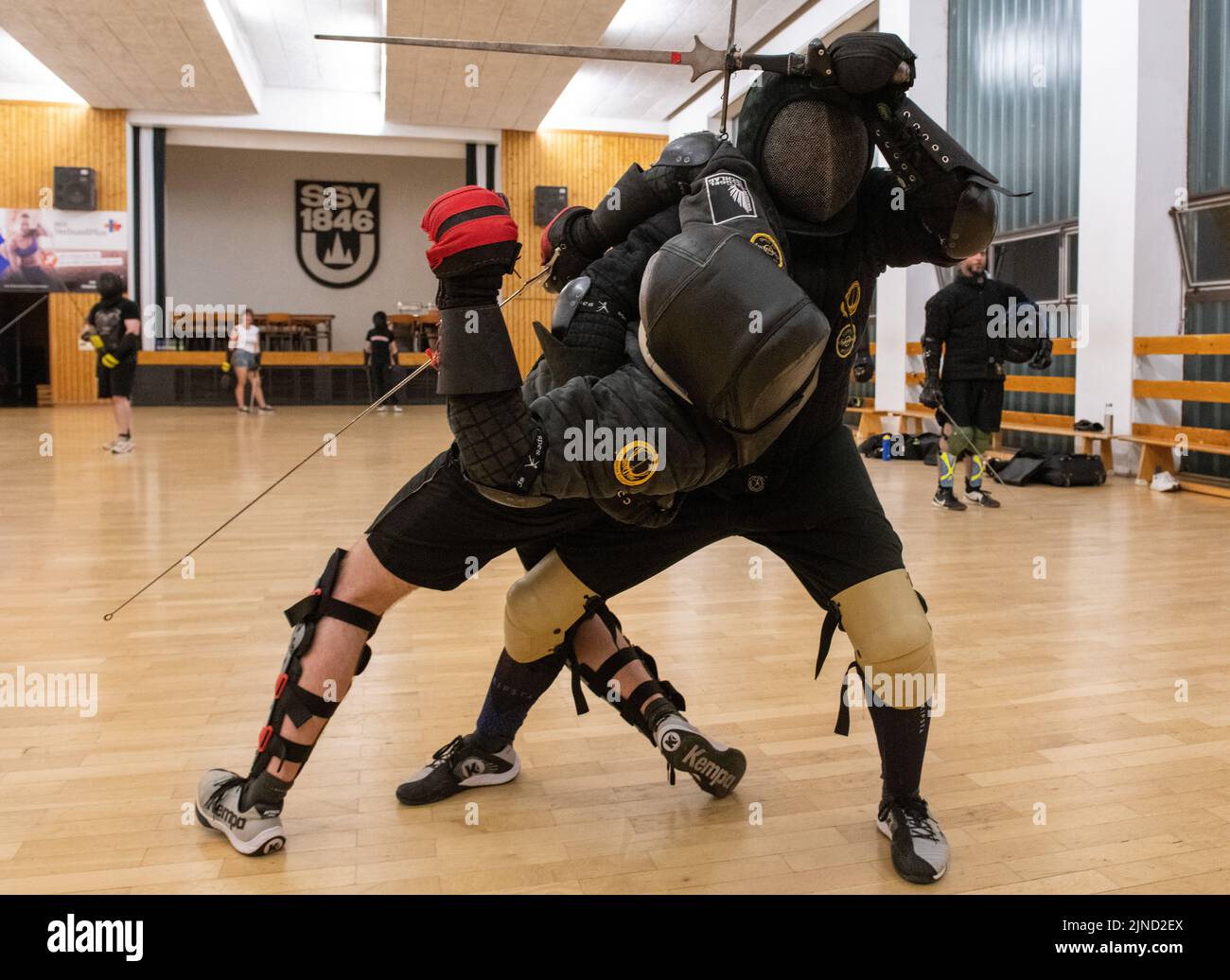 Ulm, Germany. 02nd Aug, 2022. Two athletes train swordplay in the ...