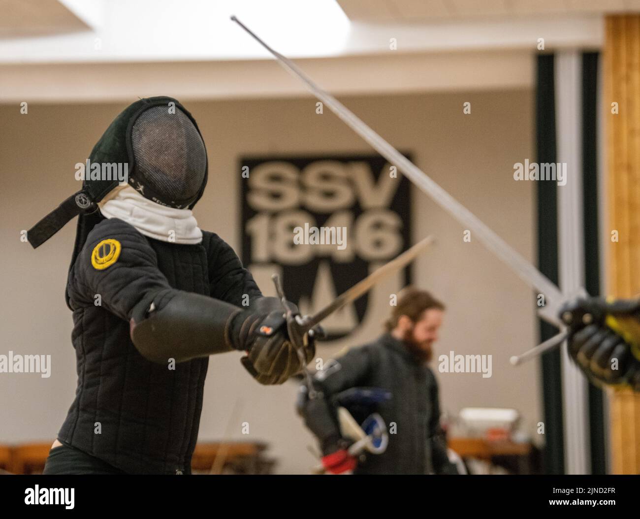 Ulm, Germany. 02nd Aug, 2022. Two athletes train swordplay in the ...