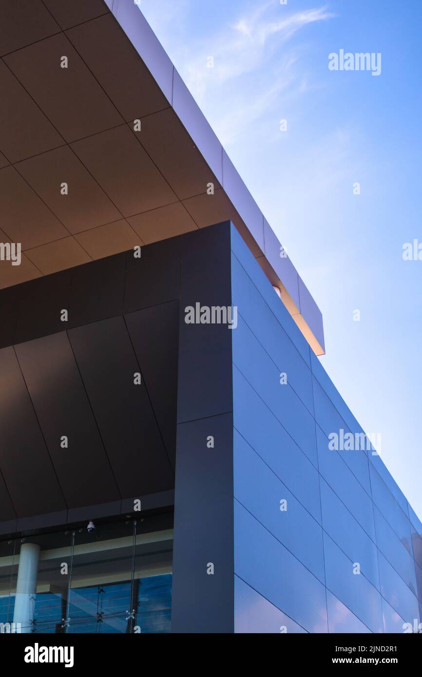 Gray building with sky in the background. Architectural structure with ...