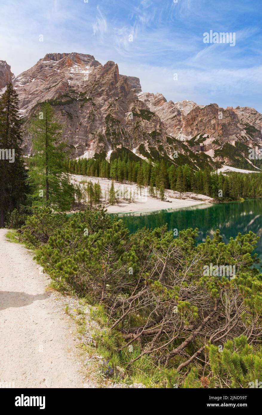 View from lakeside hiking trail to Mount Seekofel mirroring in the ...