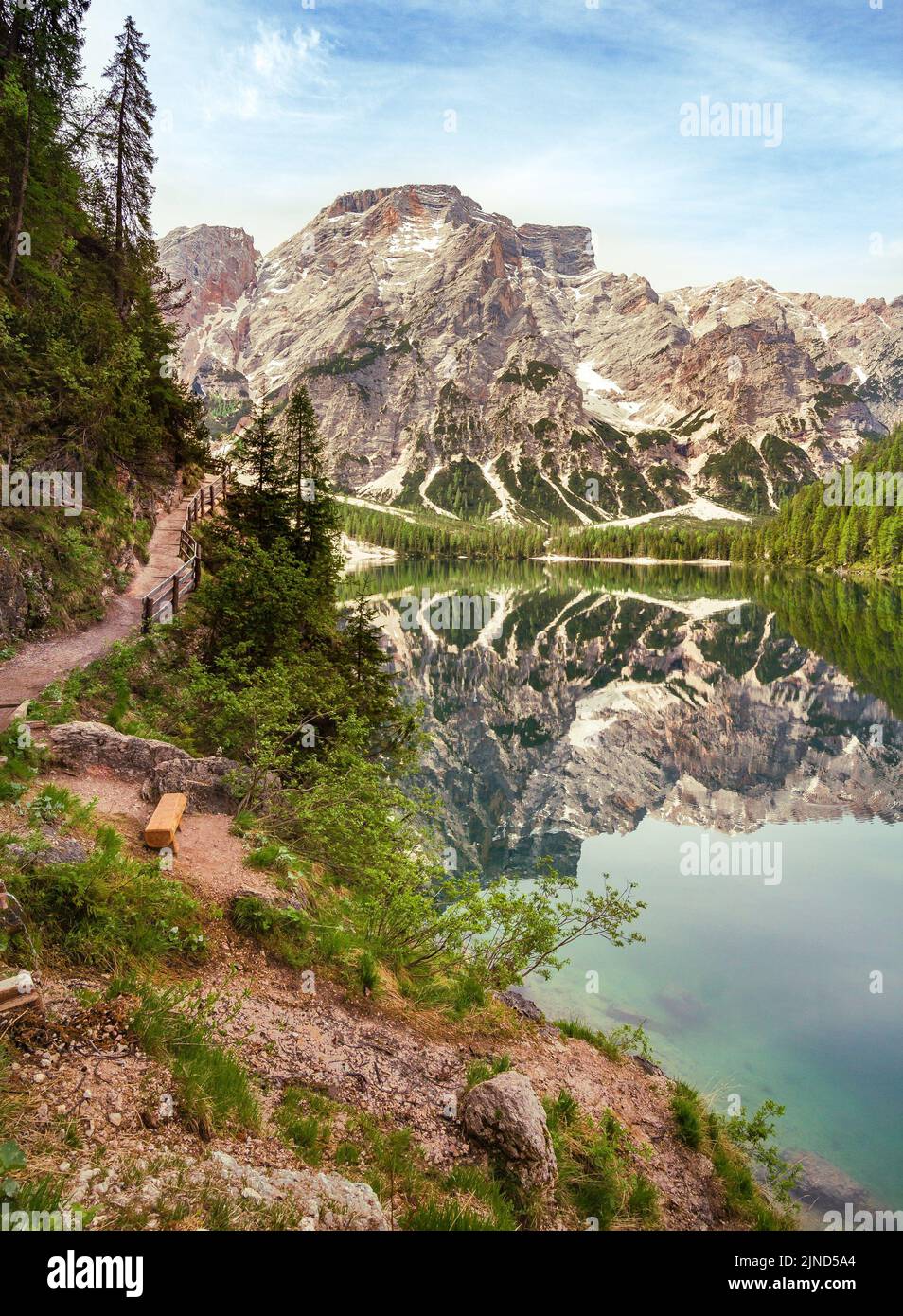 View from lakeside hiking trail to Mount Seekofel mirroring in the ...