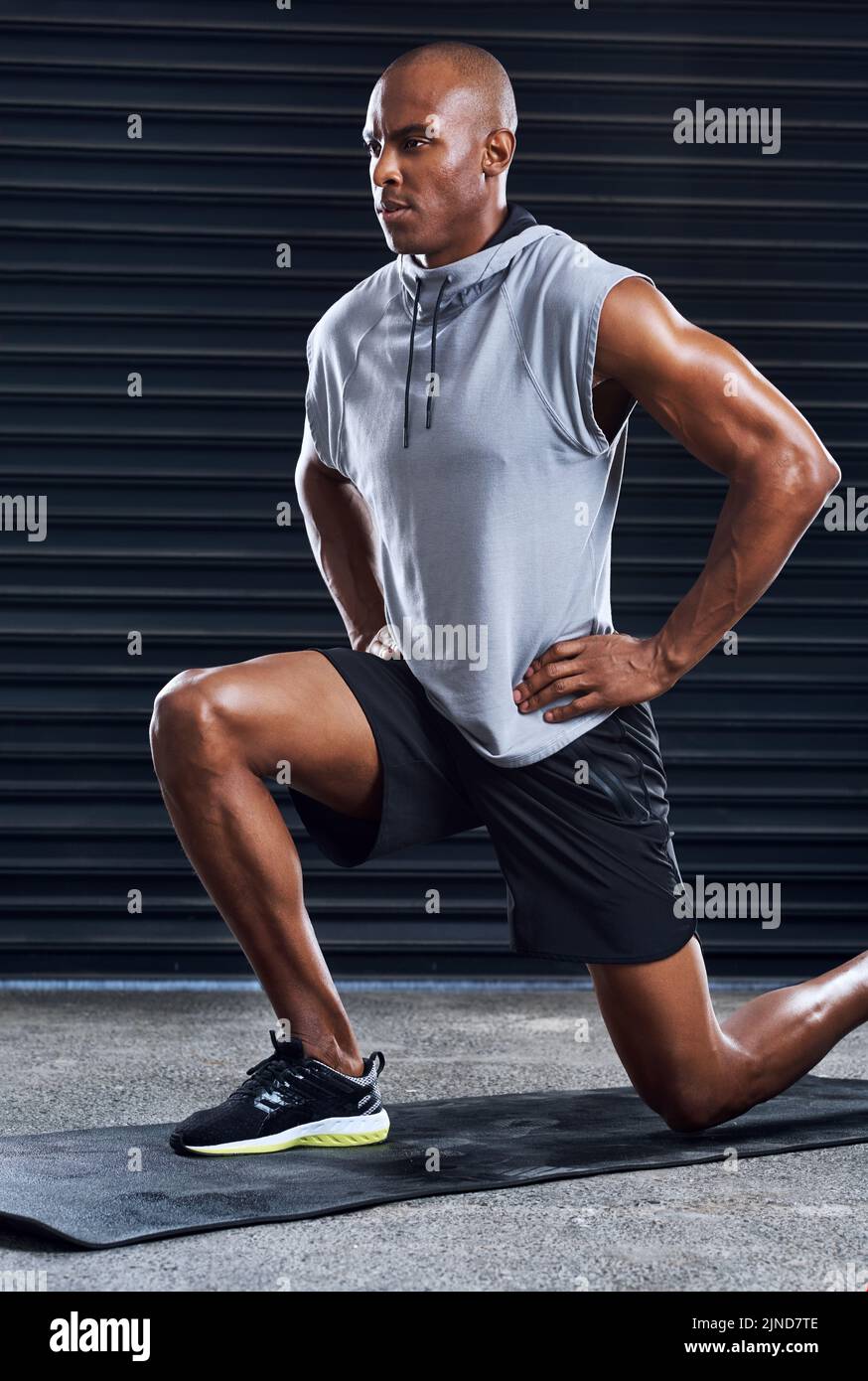 Excuses are for the lazy. a sporty young man practising his exercise ...