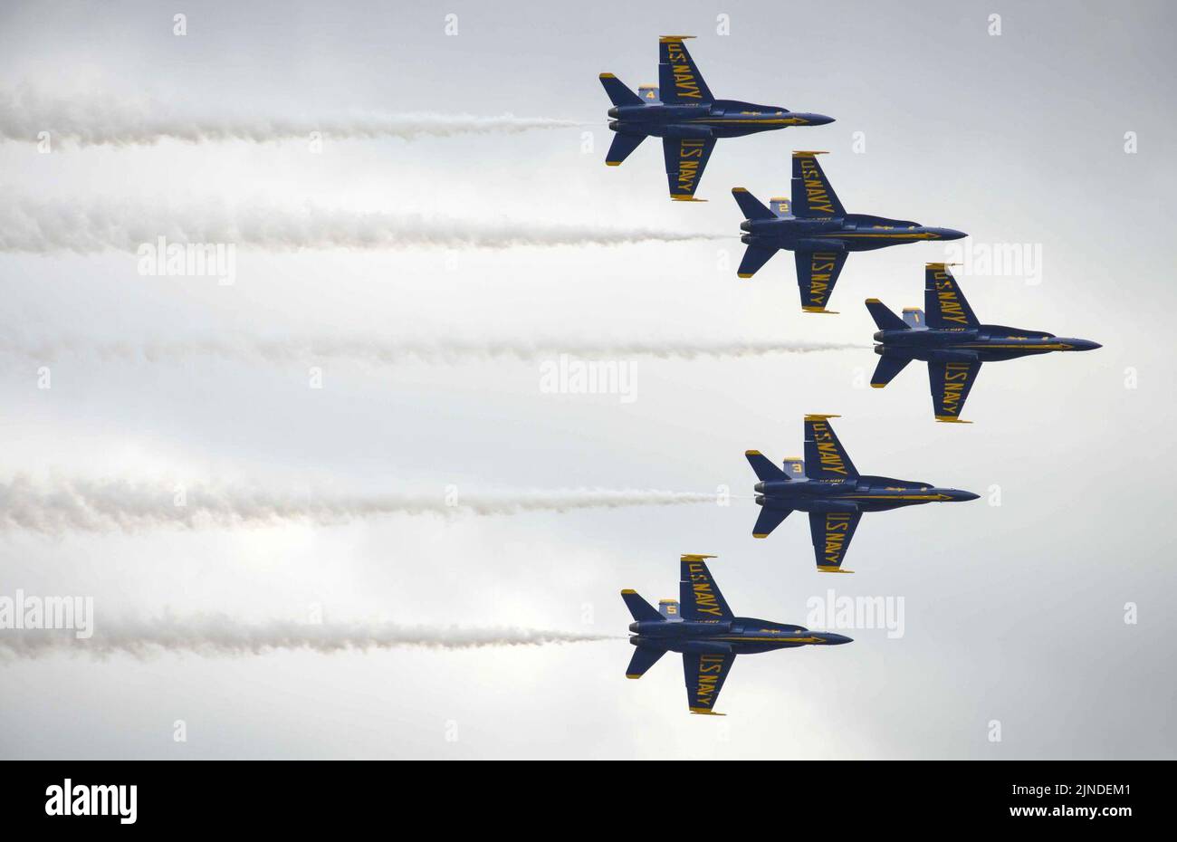 The Blue Angels fly in formation while performing at an airshow during ...